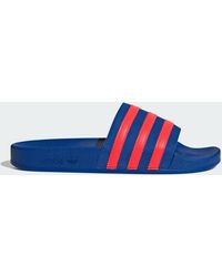 adidas Originals Adilette 25 Slides in Blue | Lyst UK