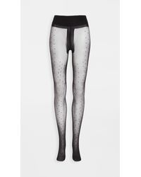 Women's Stems Tights and pantyhose from $14 | Lyst