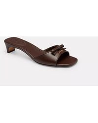 COACH Bow Thong Kitten Heel in Black | Lyst