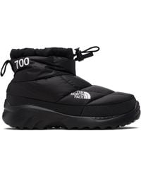 The North Face Nuptse Traction Print Boots in Black | Lyst UK