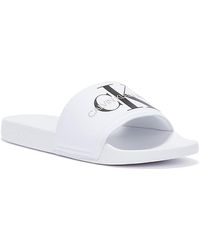 Calvin Klein Flat sandals for Women - Up to 78% off at Lyst.com