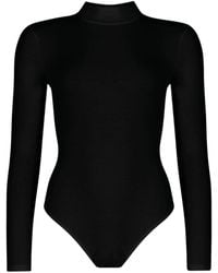 Oh Carla Turtle-Neck Bodysuit in White | Lyst UK