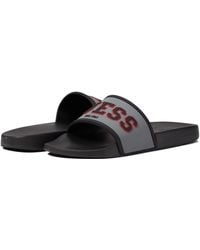 Black Guess Sandals, slides and flip flops for Men | Lyst