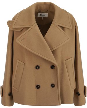 Designer Short coats for Women | Lyst
