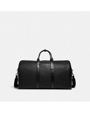Men's COACH Weekender Bags and Duffel Bags from $375 | Lyst
