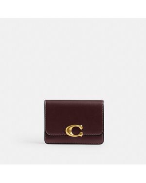 Purple COACH Wallets and cardholders for Women | Lyst