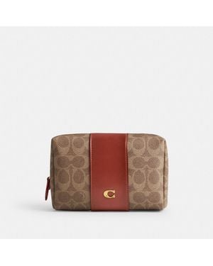 Brown COACH Makeup bags and cosmetic cases for Women | Lyst