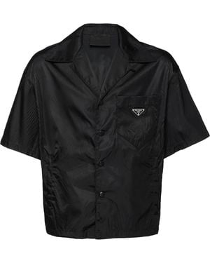 Prada Long-Sleeved Piqué And Re-Nylon Polo Shirt in Black Prada Long-Sleeved Piqué And Re-Nylon Polo Shirt in Black