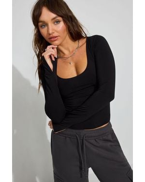 Women's Garage Long-sleeved tops from $30 | Lyst