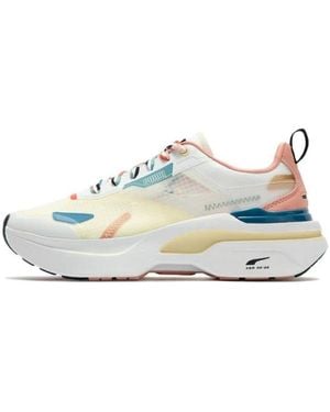 Designer White Puma Kosmo Rider Sneakers for Women | Lyst