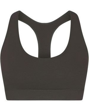 Skims Bras for Women | Lyst