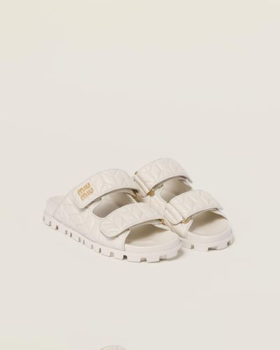 Miu Miu Slides for Women - Up to 39% off | Lyst