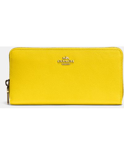 Yellow COACH Wallets and cardholders for Women | Lyst