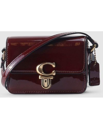 Purple COACH Crossbody bags and purses for Women | Lyst