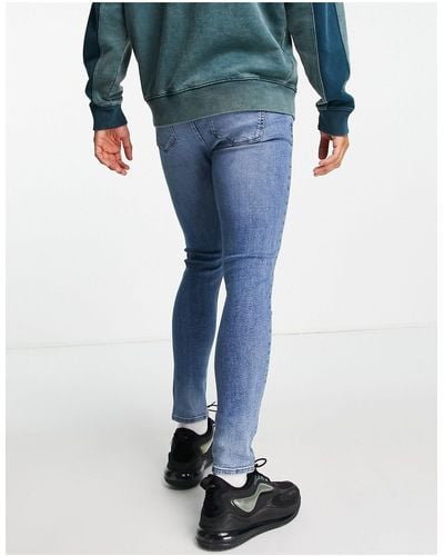Powder Blue Jeans for Men | Lyst