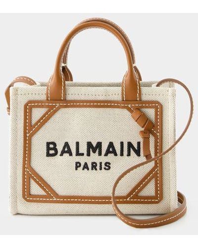 Metallic Balmain Tote bags for Women | Lyst