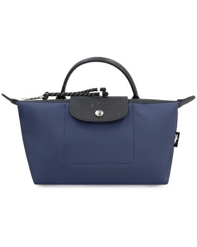 Blue Longchamp Clutches and evening bags for Women | Lyst