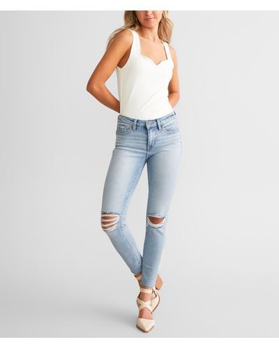 Buckle Black Ripped Skinny Jeans for Women | Lyst