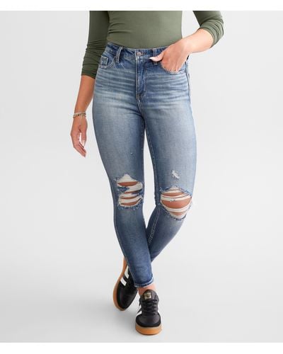 Buckle Black Ripped Skinny Jeans for Women | Lyst