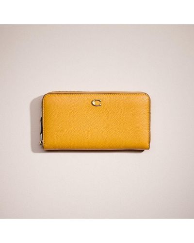Yellow COACH Wallets and cardholders for Women | Lyst