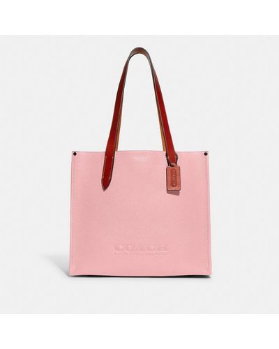 Pink COACH Bags for Men | Lyst