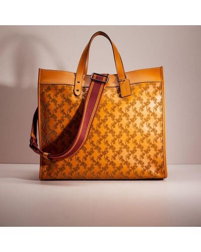 Orange COACH Bags for Men | Lyst