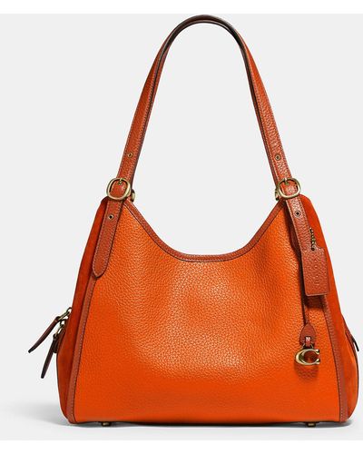 Orange Coach Outlet Shoulder bags for Women | Lyst