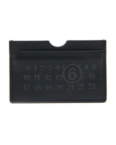 Black MM6 by Maison Martin Margiela Wallets and cardholders for Men | Lyst
