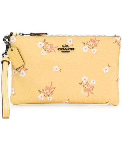 Yellow COACH Wallets and cardholders for Women | Lyst