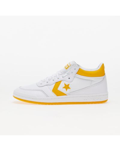 Blue and Yellow Sneakers for Women | Lyst