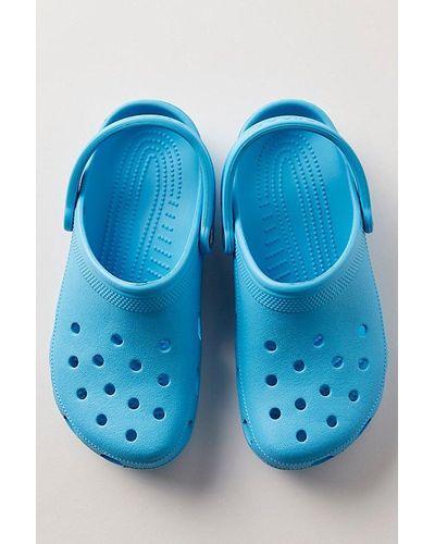 Blue Crocs™ Flats for Women | Lyst