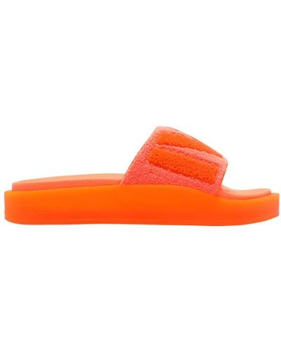 Orange adidas Sandals, slides and flip flops for Men | Lyst