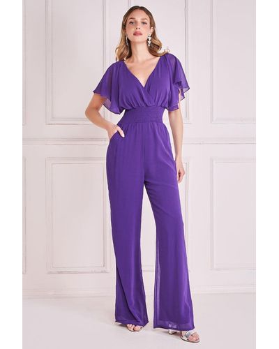 Purple and Yellow Jumpsuits and rompers for Women | Lyst