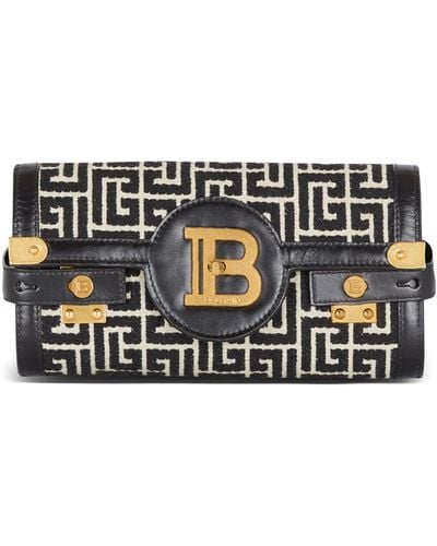 Black Balmain Clutches and evening bags for Women | Lyst