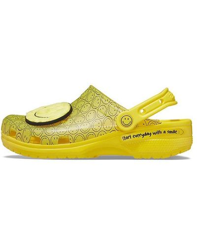 Yellow Crocs™ Sandals and Slides for Men | Lyst