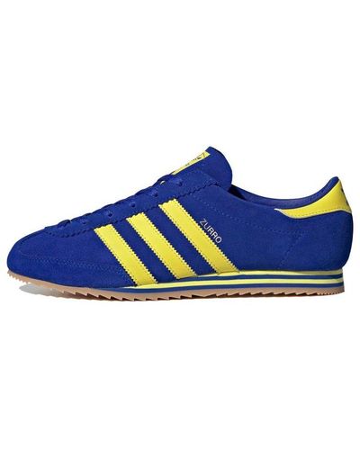 Blue and Yellow Sneakers for Men | Lyst