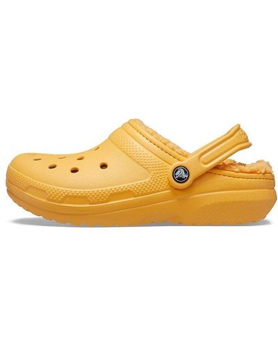 Yellow Crocs™ Slip-on shoes for Men | Lyst