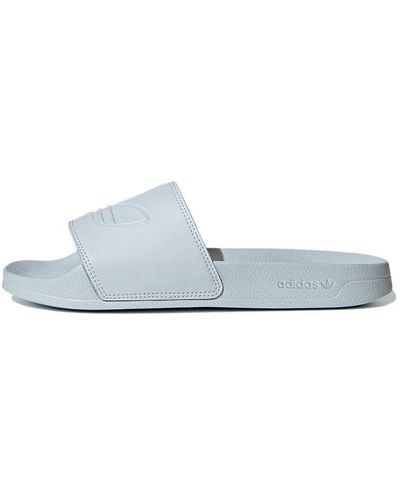 Blue adidas Slip-on shoes for Men | Lyst