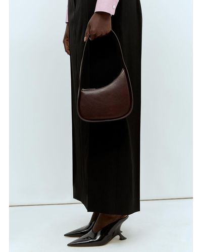 The Row Half Moon Bags for Women | Lyst