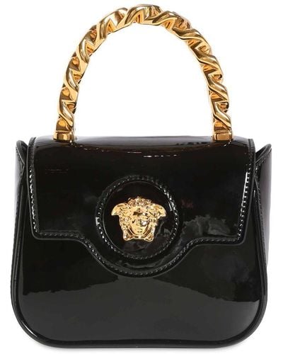 Black Versace Top-handle bags for Women | Lyst