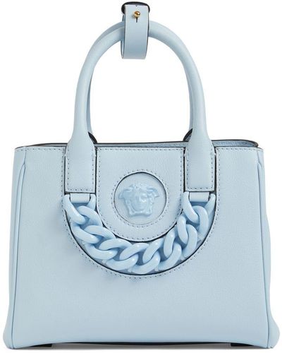 Blue Versace Tote bags for Women | Lyst