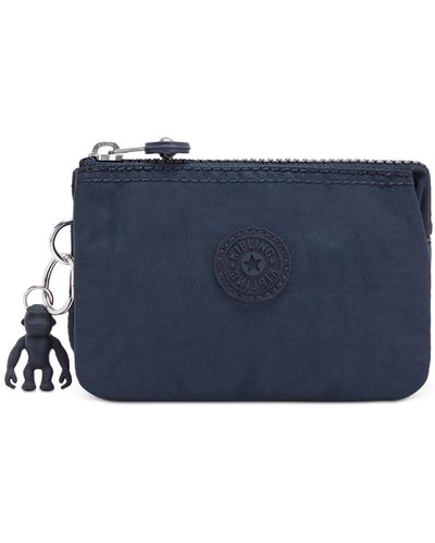 Blue Kipling Clutches and evening bags for Women | Lyst