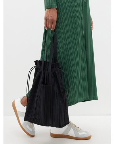 Black Pleats Please Issey Miyake Tote bags for Women | Lyst