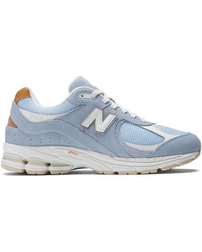 Blue New Balance Sneakers for Men | Lyst