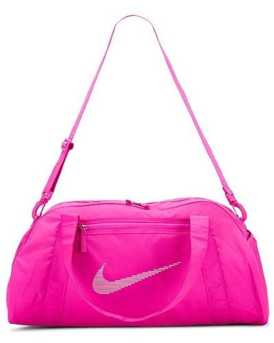 Pink Nike Duffel bags and weekend bags for Women | Lyst