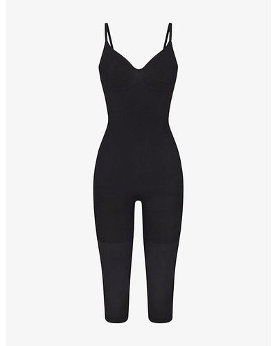 Black Skims Jumpsuits and rompers for Women | Lyst