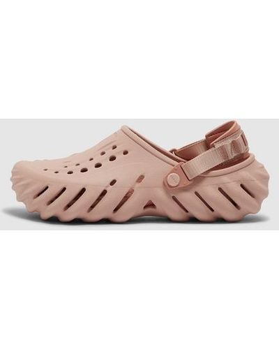 Pink Crocs™ Slip-on shoes for Men | Lyst