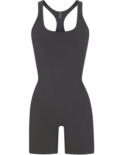 Black Skims Jumpsuits and rompers for Women | Lyst