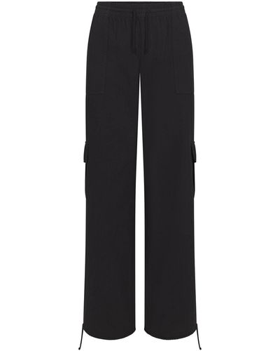Women's Skims Cargo pants from $78 | Lyst
