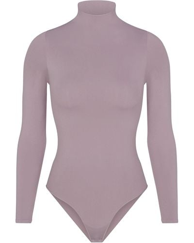 Skims Mock Neck Bodysuits for Women - Up to 49% off | Lyst